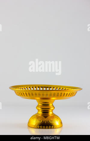 golden ware isolate in white background Stock Photo - Alamy