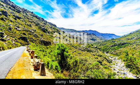The narrow and scenic Bainskloof Pass through the Witte River or ...