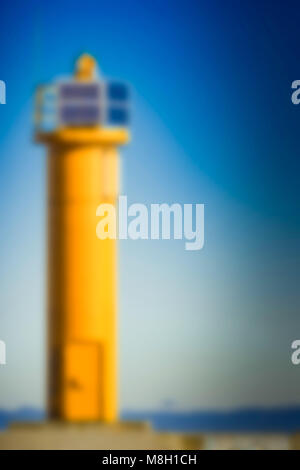 Yellow lighthouse - soft lens bokeh image. Defocused background Stock ...