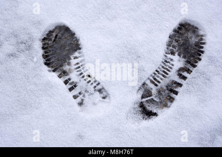 Winter scenic. Trace of boot in the snow Stock Photo - Alamy