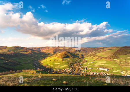 Sunny spring day. Green mountain valley. Beautiful spring landscape ...