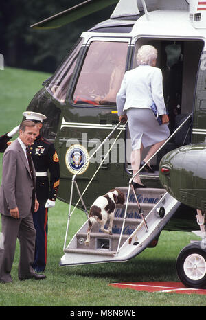 President George Bush follows his dog Ranger as he starts out jogging ...