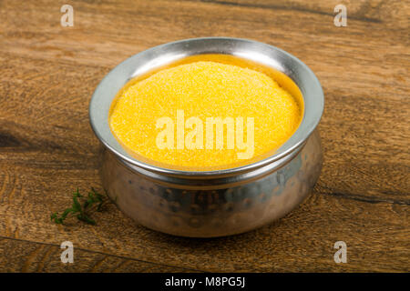 Raw polenta ready for cooking Stock Photo - Alamy