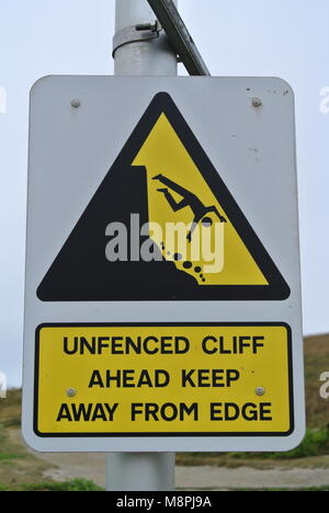 " unfenced cliff sign Stock Photo - Alamy