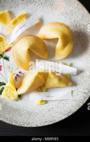 Plate with fortune cookies on beige background. Valentine's Day ...