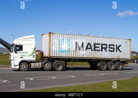 Lorry carrying a Maersk container at a shipping depot in Valencia ...