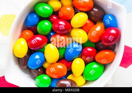 Travel Retail Edition Almond M&Ms in bowl Stock Photo - Alamy