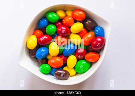 Travel Retail Edition Almond M&Ms in bowl Stock Photo - Alamy