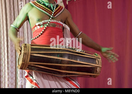 sri lankan traditional drummer playing a traditional drum called ...