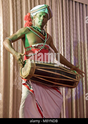 sri lankan traditional drummer playing a traditional drum called ...
