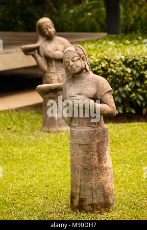A beautiful view of a stone lady sculpture on the background of a ...