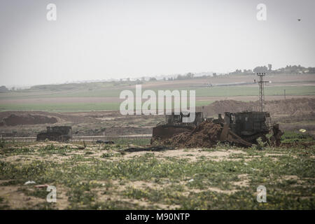 Jabalya, Gaza. 20th Mar, 2018. An Israeli D9 bulldozer patrols along ...