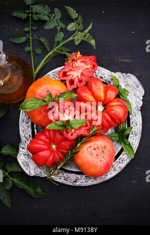 Red American ribbed tomato vegetable closeup isolated on white ...