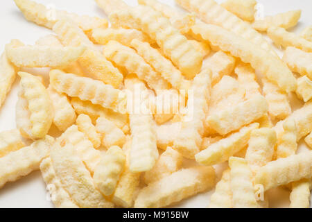 Freeze potato stick on the white background Stock Photo - Alamy