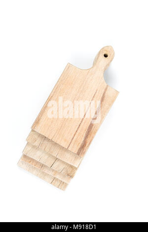Stack of wooden cutting or chopping boards on kitchen table Stock Photo ...