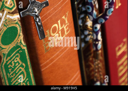 Stack of holy books : Bible and Quran. Christianity and Islam Stock ...