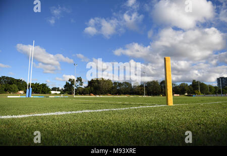 Rugby Goal Posts and corner post on a green field Stock Photo - Alamy