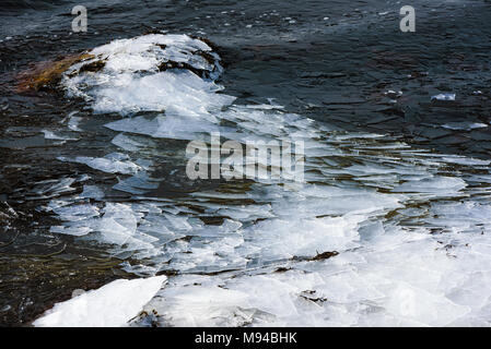 Flakes of sea ice piling up Stock Photo - Alamy