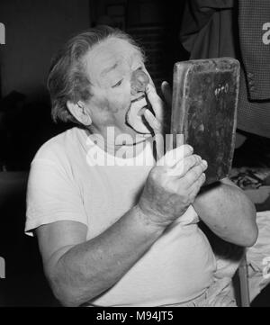 Otto Griebling prepares applies his make-up before a performance with ...