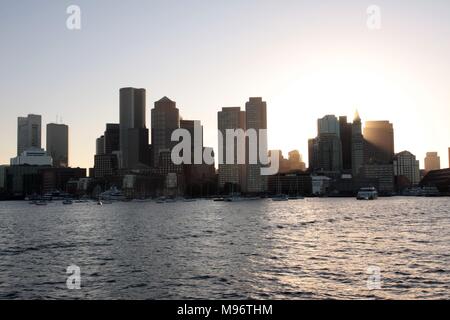 Boston skyline at sunset during a cruise in the bay Stock Photo - Alamy