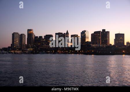Boston skyline at sunset during a cruise in the bay Stock Photo - Alamy