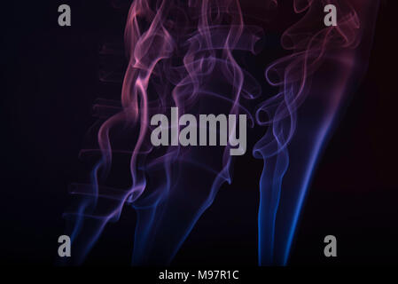 Dynamic black smoke forming the shape of human lungs, set against a ...