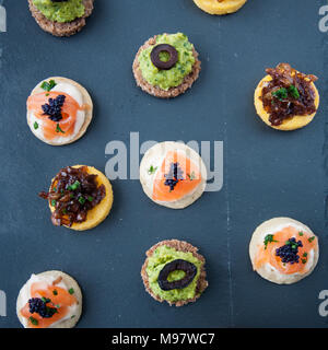 group of canapés on serving board Stock Photo - Alamy