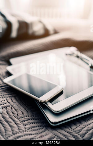 Stack of three mobile devices Stock Photo - Alamy