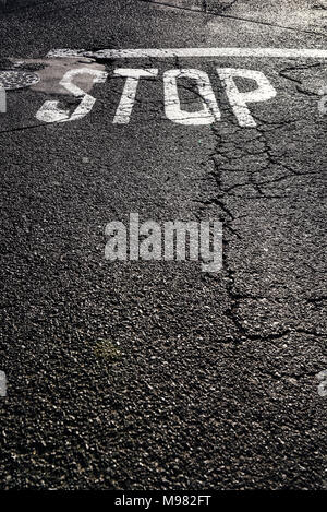stop sign on tarmac Stock Photo - Alamy