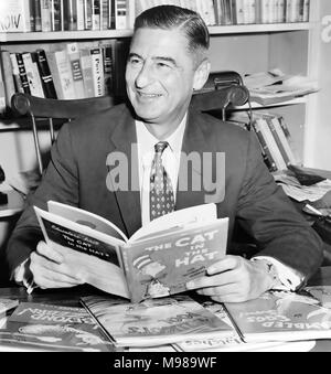 Ted Geisel (Dr. Seuss) (1904-1991) at work on a drawing of the Grinch ...