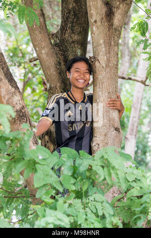 a women at a Tamarind tree at the wat khao Angkhan south of the city of ...