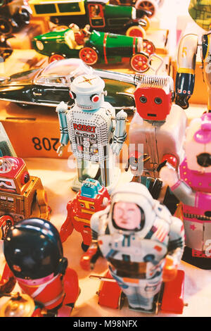Group of Retro Robot toys. Vintage tin robots on display Stock Photo ...