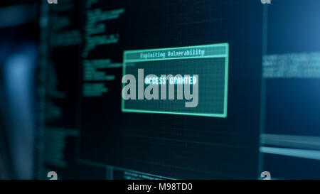 Display Showing Stages of Hacking in Progress: Exploiting Vulnerability, Executing and Granted ...