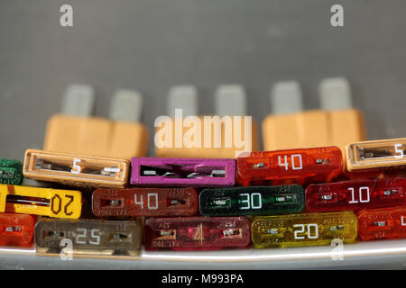 Automotive fuses come in different colors and each color is responsible ...