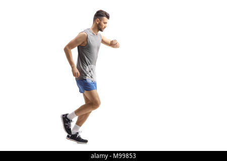 Full length profile shot of an athletic female in a running pose ...