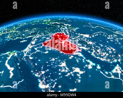 Night view of Iraq highlighted in red on planet Earth with atmosphere ...