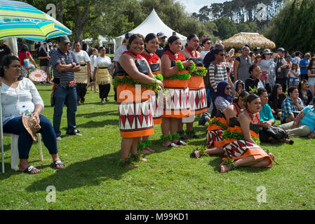 Spectators seated and standing as they watch dance performances at ...