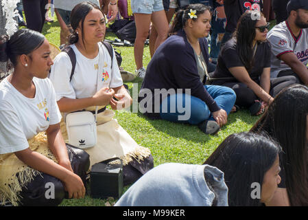 Spectators seated and standing as they watch dance performances at ...