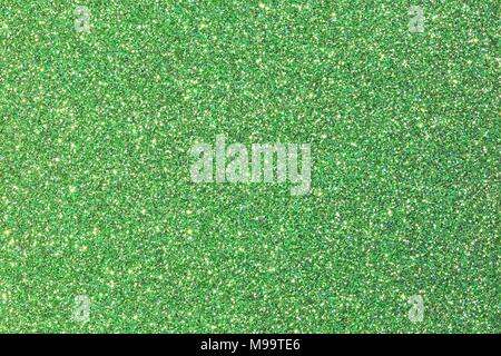 wide shimmering GREEN glitter material background with sparkles ideal ...