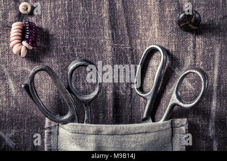 Vintage scissors in small pocket in tailor mat Stock Photo - Alamy