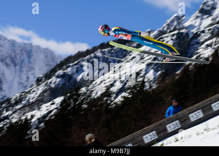 Kevin Bickner, of the United States, soars through the air during his ...