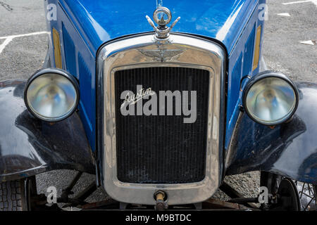 The radiator grill and headlights of an Austin 7 classic car on display ...
