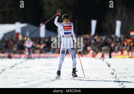 Jarl Magnus Riiber, of Norway, celebrates after crossing the finish ...