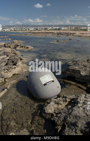 Large environmentally unfriendly plastic refuse ball on the beautiful ...