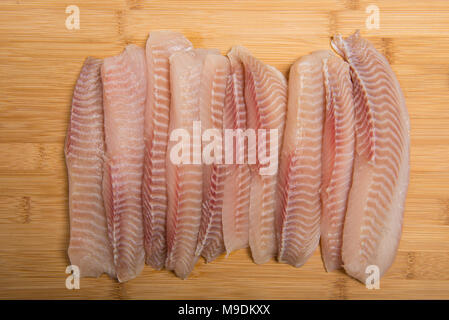 Close up of fresh or unfrozen set of filleted fish Stock Photo - Alamy