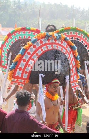 procession of puthan and thira,or lord siva and goddess kaali,in ...