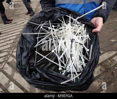 Volunteer clean up of the river Thames in London. Plastic pollution in ...