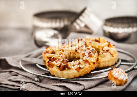 Ring shortbread cookies with peanuts on top Stock Photo - Alamy