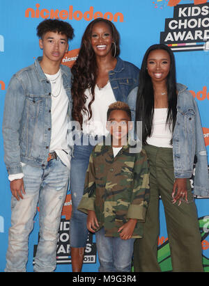 Beverly Peele, Cairo Peele, Trey Peele-Nygard, DJ Peele walking on the ...