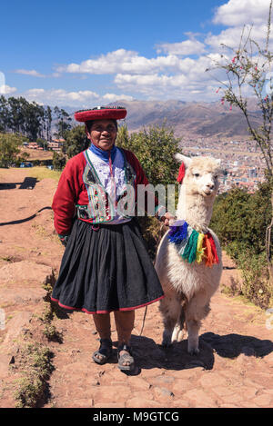 Peruvian Quechuan woman wearing traditional hat or montera and shawl ...